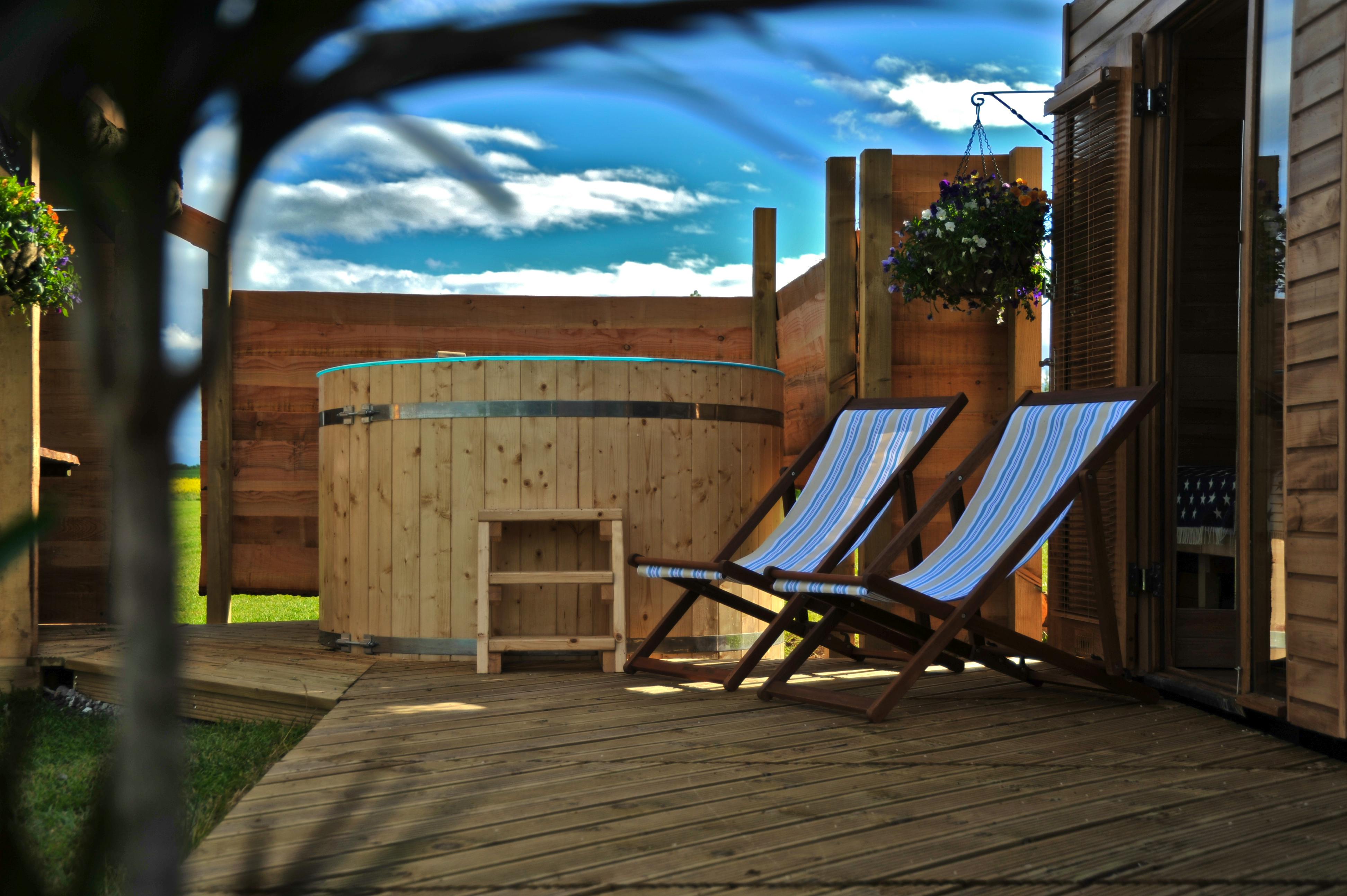 Tinywood Houses - Miniature glamping homes with open-air hot tubs